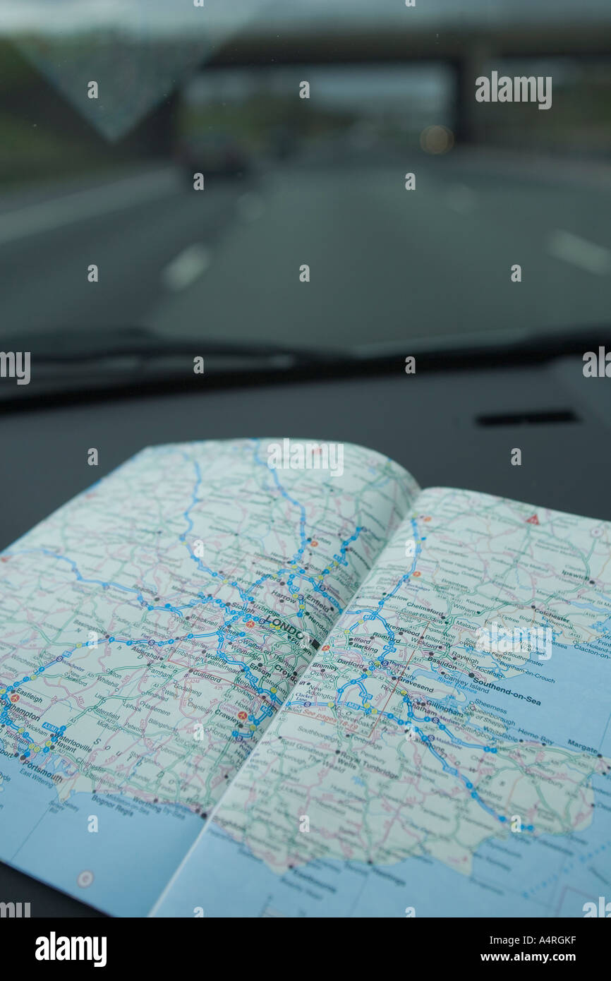 Close up of a map on the dashboard of a car Stock Photo - Alamy