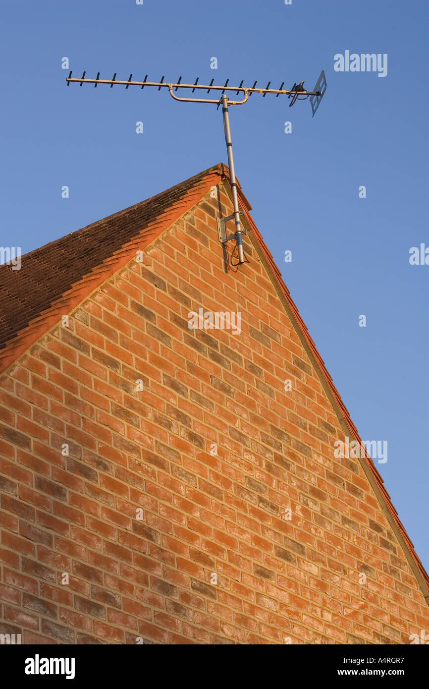 Antenna on the roof of a building Stock Photo - Alamy