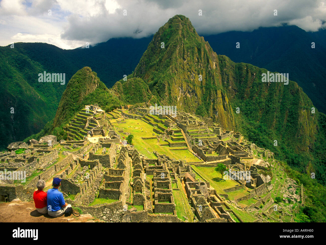 people tourists visiting Machu Picchu aka The Lost City of the Incas an ...