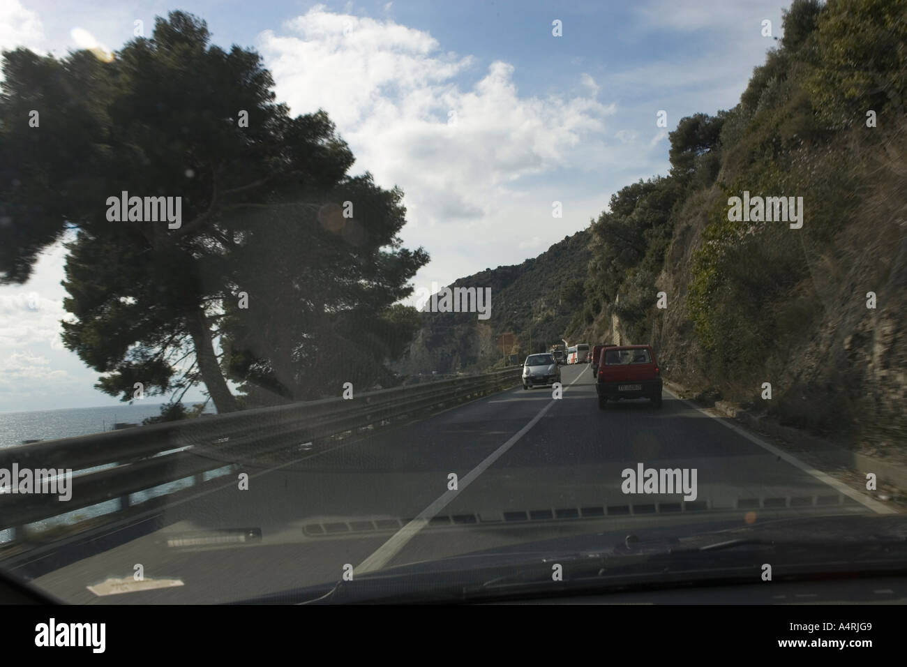 Cars moving on a road Stock Photo - Alamy
