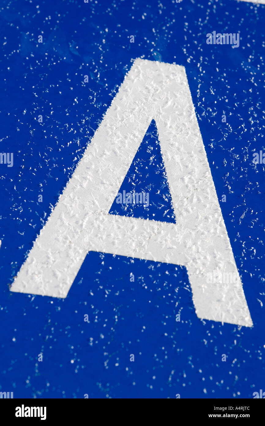 Close up of the letter A on a blue background Stock Photo - Alamy