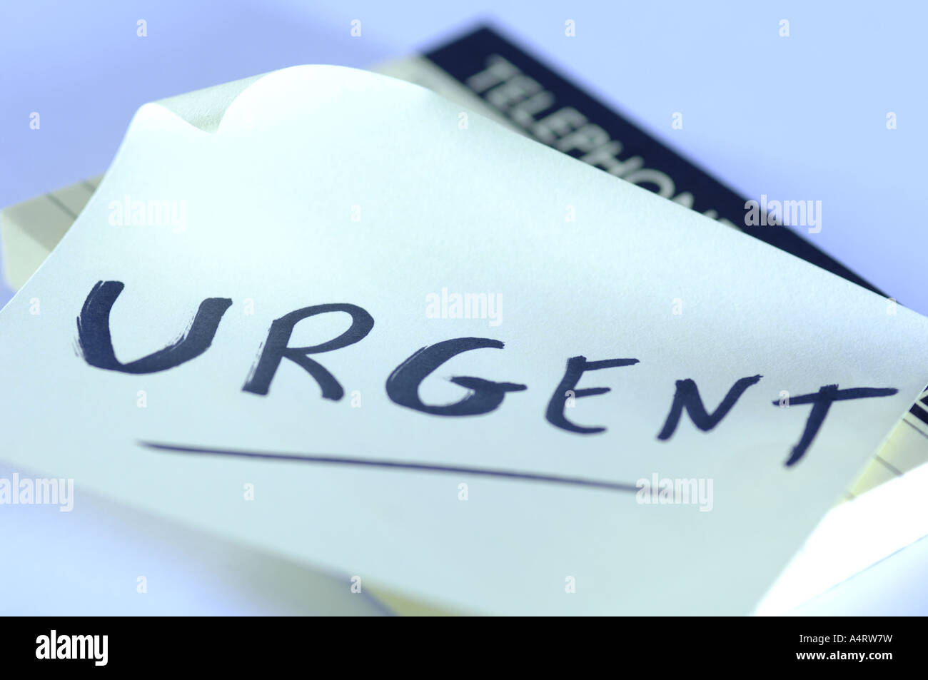 urgent stick message Stock Photo - Alamy