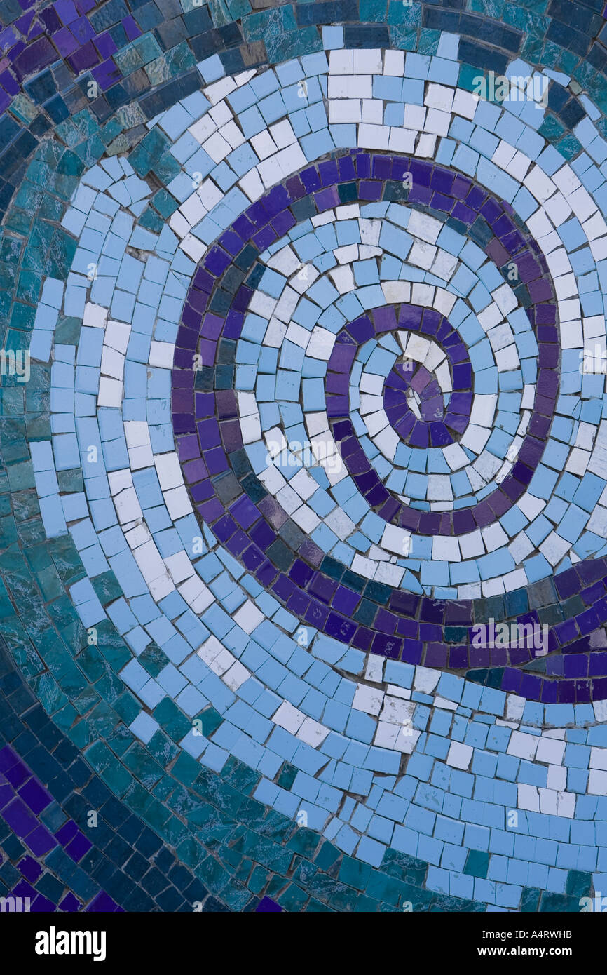 Close up of a mosaic tile spiral pattern on a wall Stock Photo - Alamy