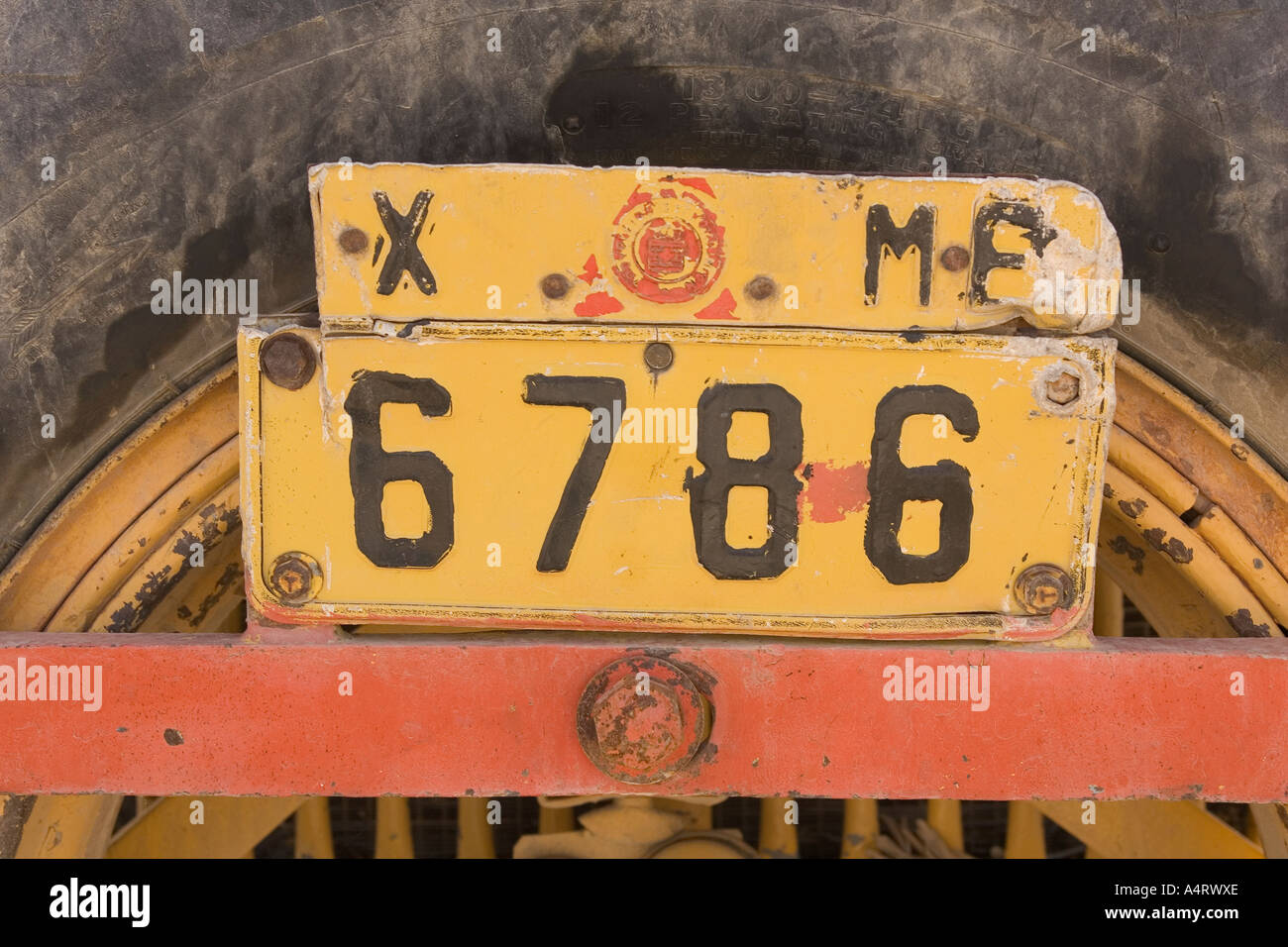 Number plate over a metal wheel Stock Photo - Alamy