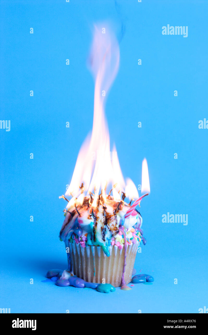 Birthday cupcake burned and melted by out of control candle flames ...
