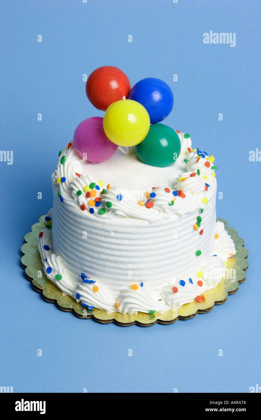 Birthday cake with balloon topper Stock Photo - Alamy