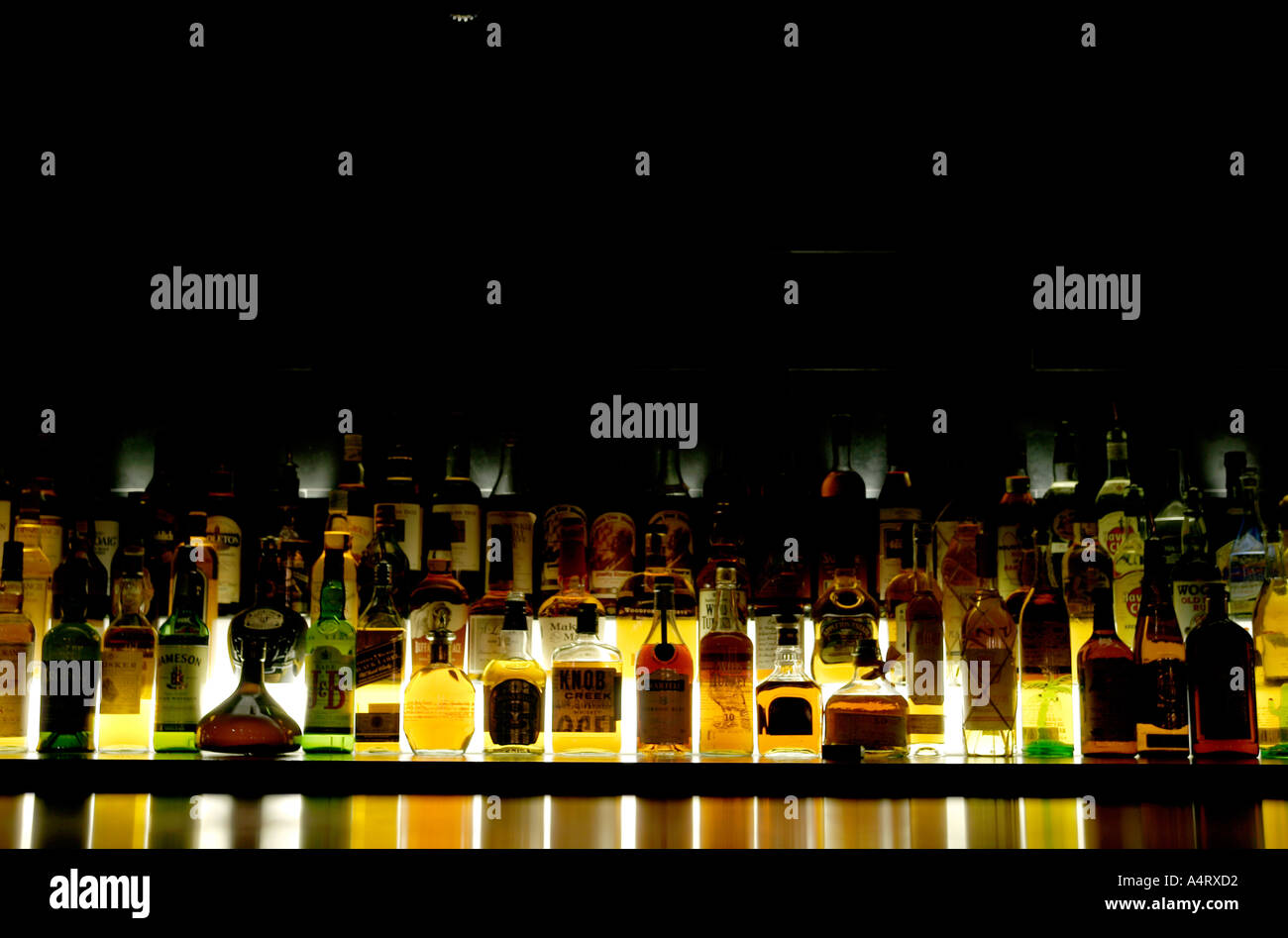 bottles Back bar of a club in london Stock Photo - Alamy