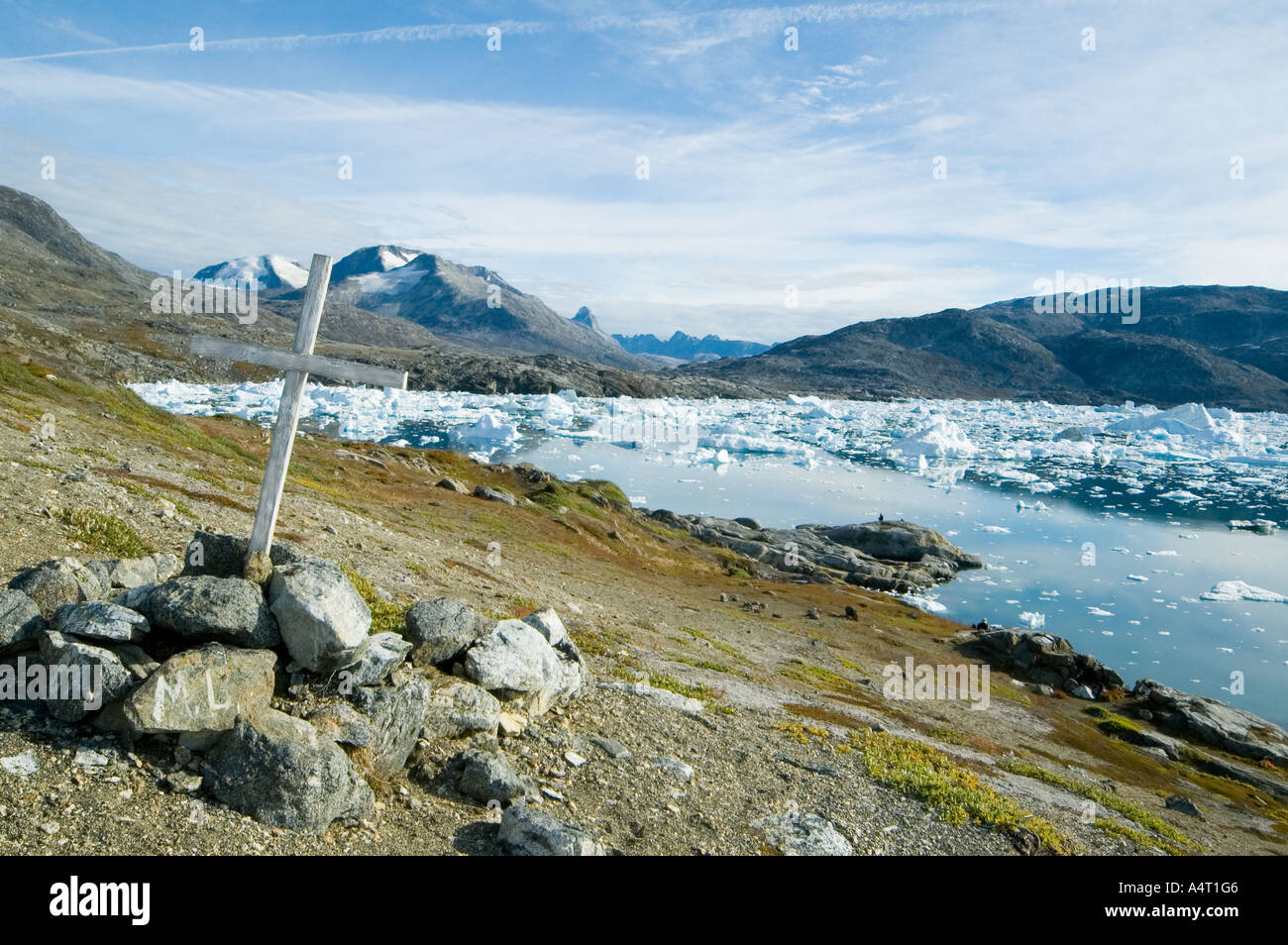 Wooden cross on a grave at the abandoned Inuit settlement of ...