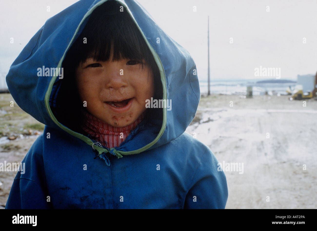 Inuit mother with child carried inside hood on Baffin island NWT Stock ...