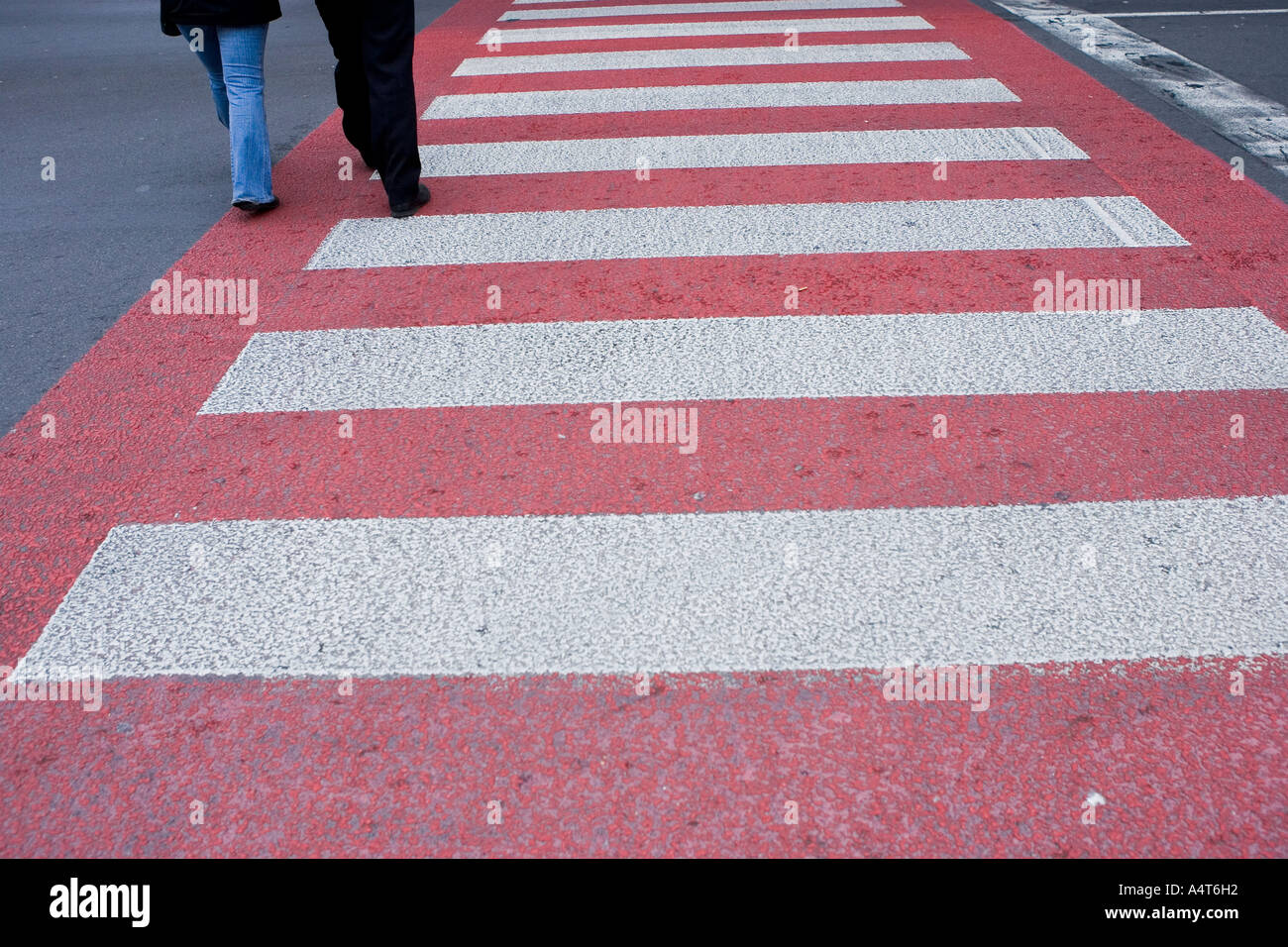 Two people crossing zebra crossing hi-res stock photography and images ...