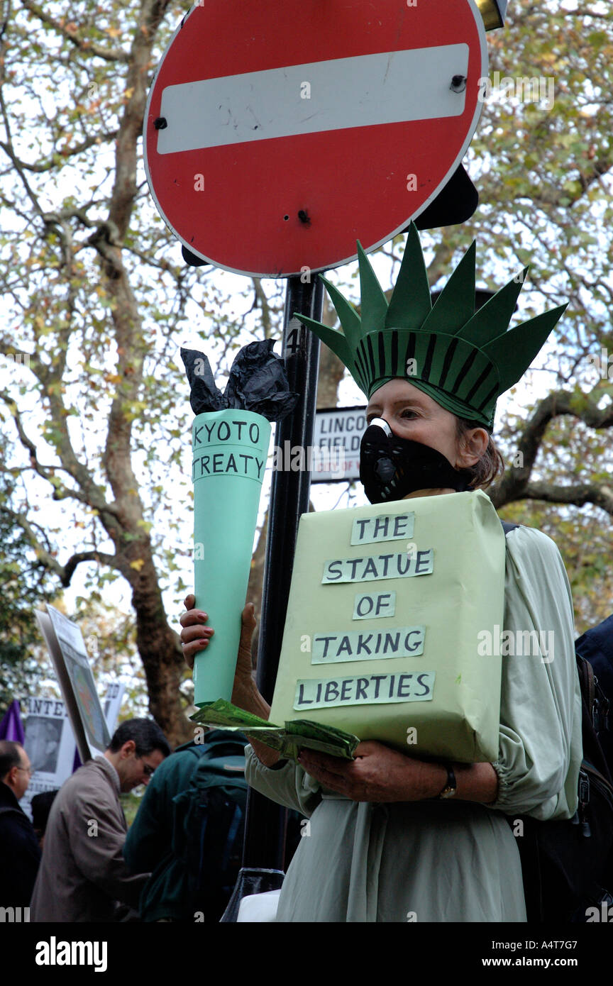 Woman dressed at Statue of Liberty at Climate Change Environmental ...