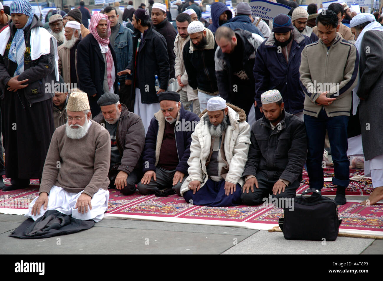 Muslims praying in Trafalgar Square during demonstration by Muslims ...