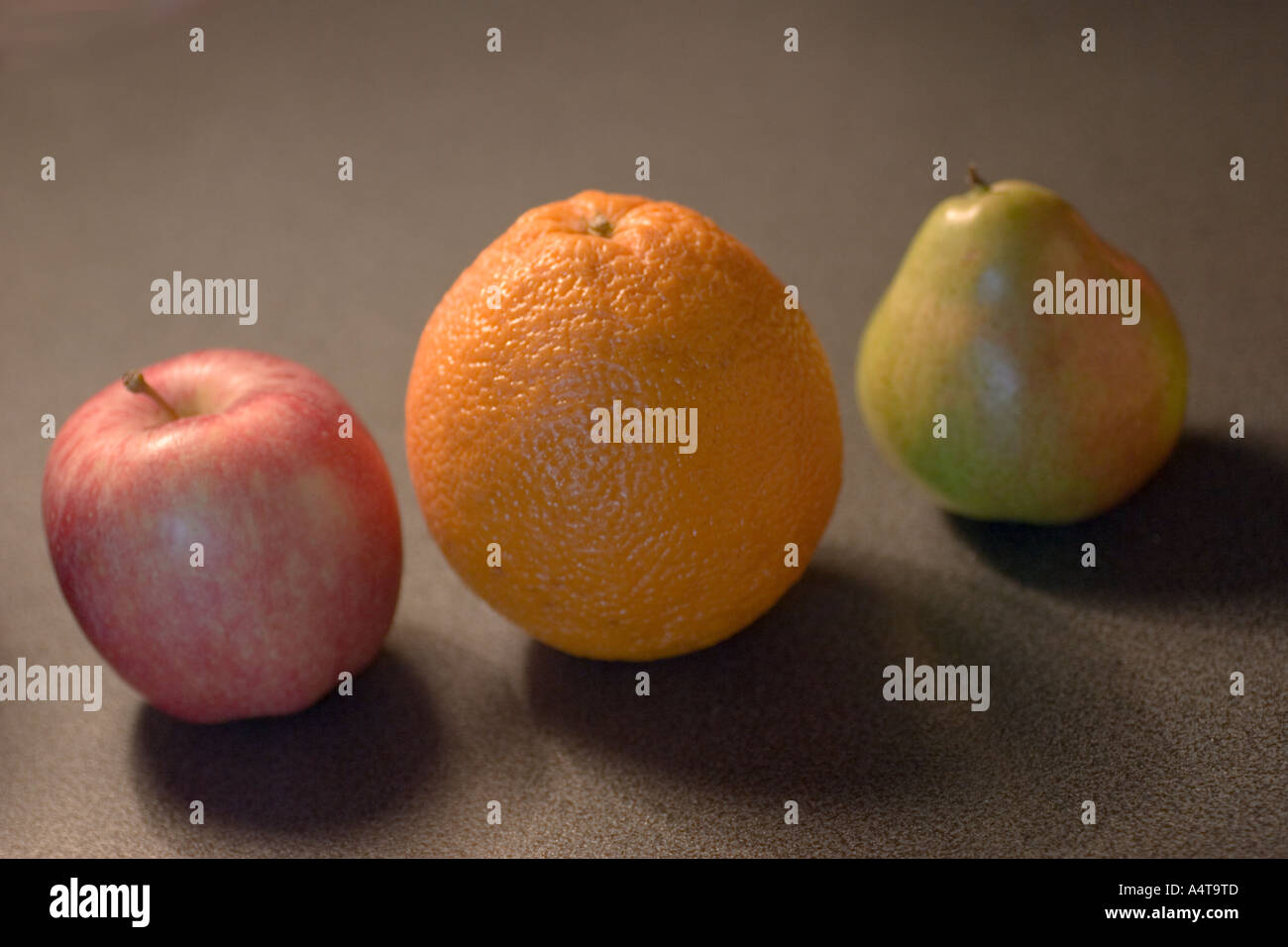 Apple, Orange and Pear Stock Photo - Alamy
