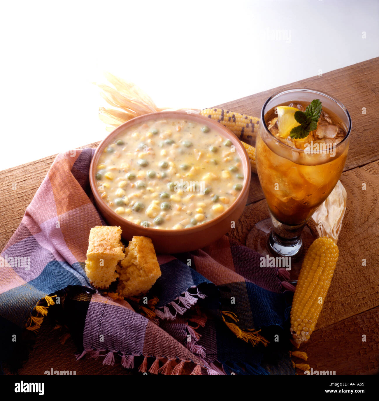 Corn Chowder with corn bread and iced tea Stock Photo - Alamy