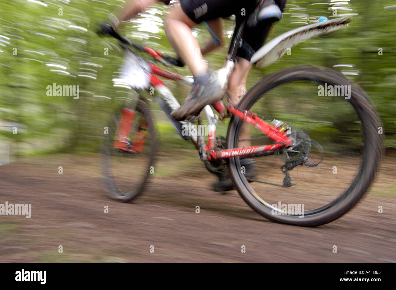 cycling past in a blur Stock Photo - Alamy