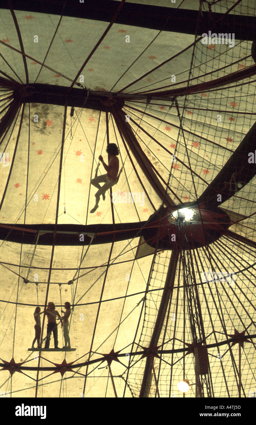 Trapeze artists in the circus Stock Photo - Alamy