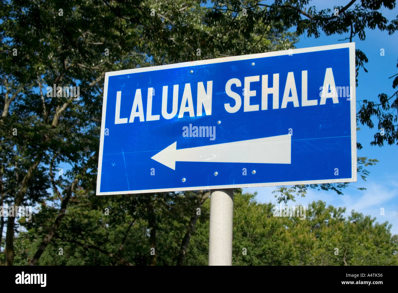 one way street signboard from malaysia Stock Photo - Alamy