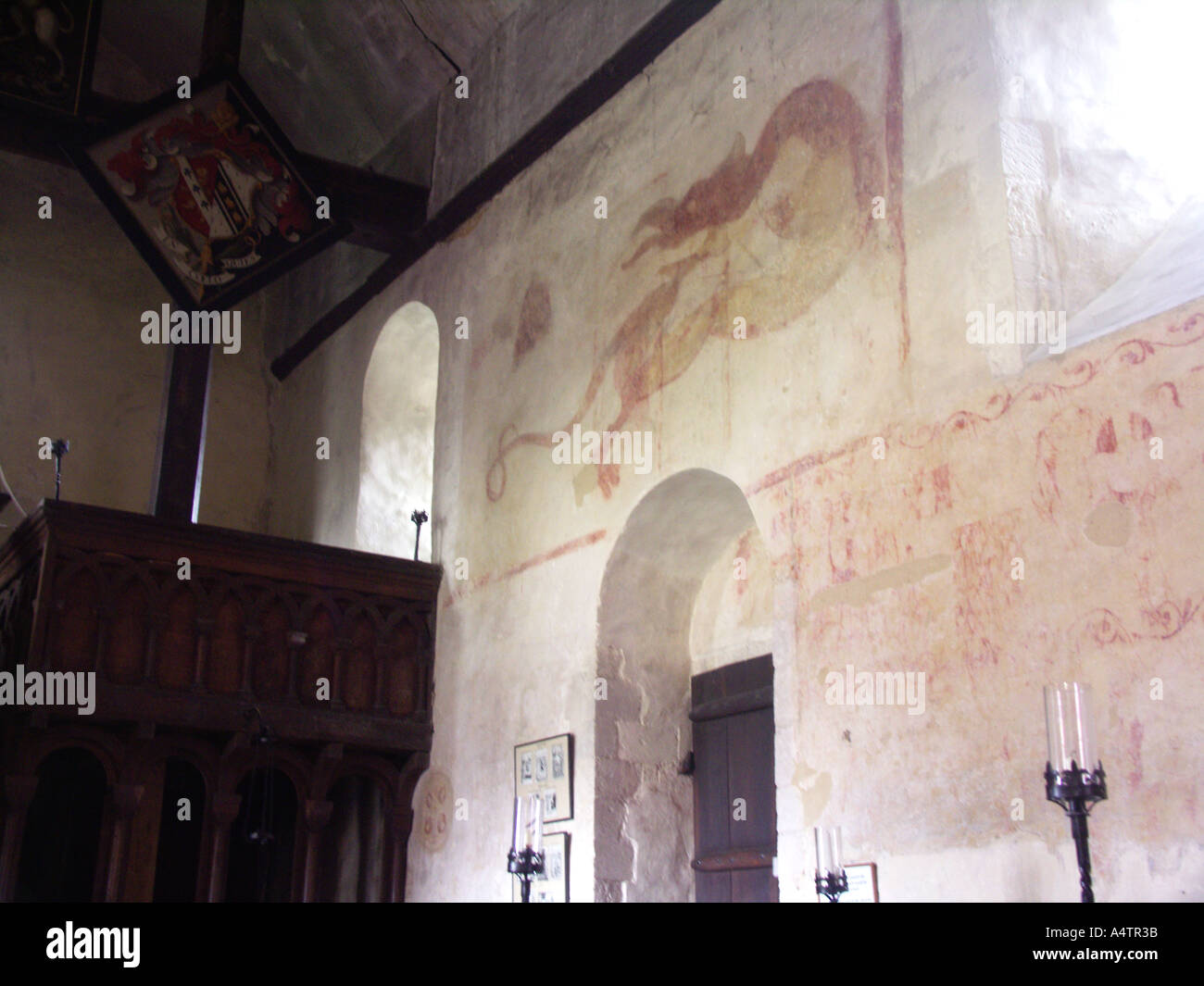 Dragon wall painting Wissington church near Bures Suffolk England Stock ...