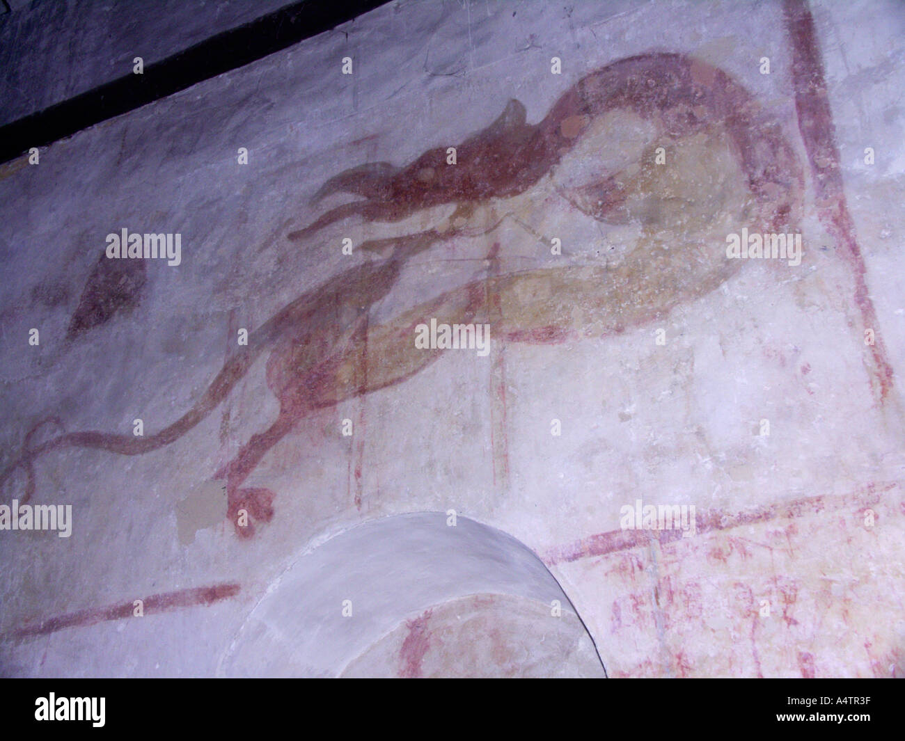 Dragon wall painting Wissington church near Bures Suffolk England Stock ...