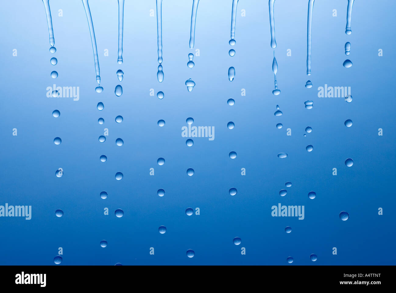 many water drops falling looking like rain or a shower in the bathroom ...