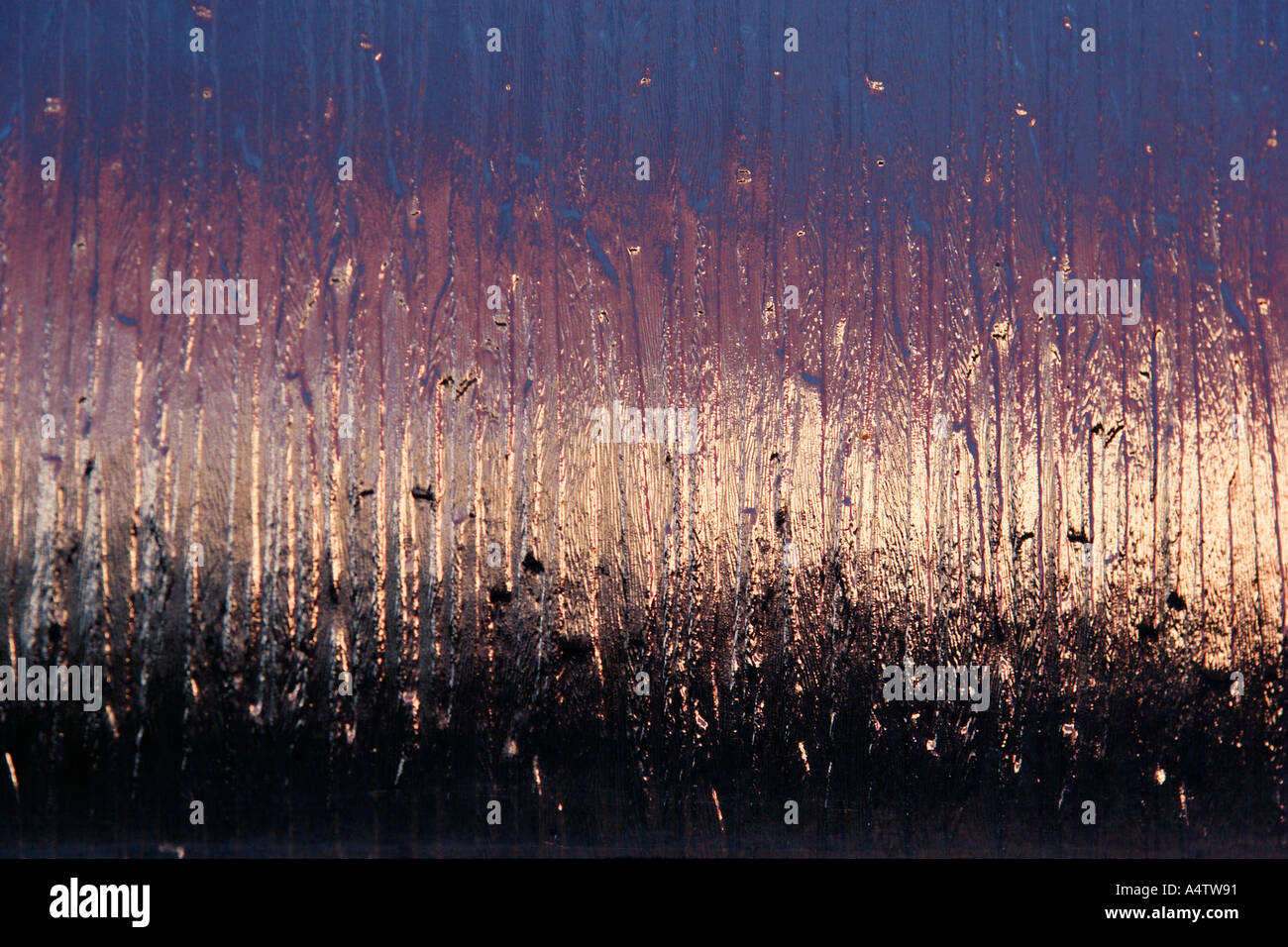 Abstract vision of dusk through mottled glass Stock Photo - Alamy