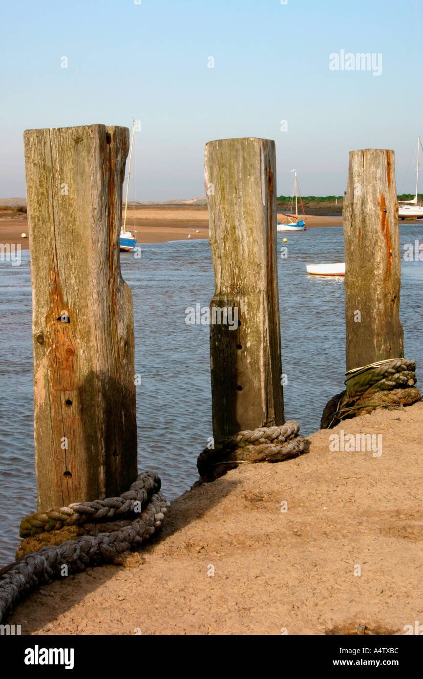 Mooring Posts at Burnham Overy Staithe, Norfolk Stock Photo - Alamy