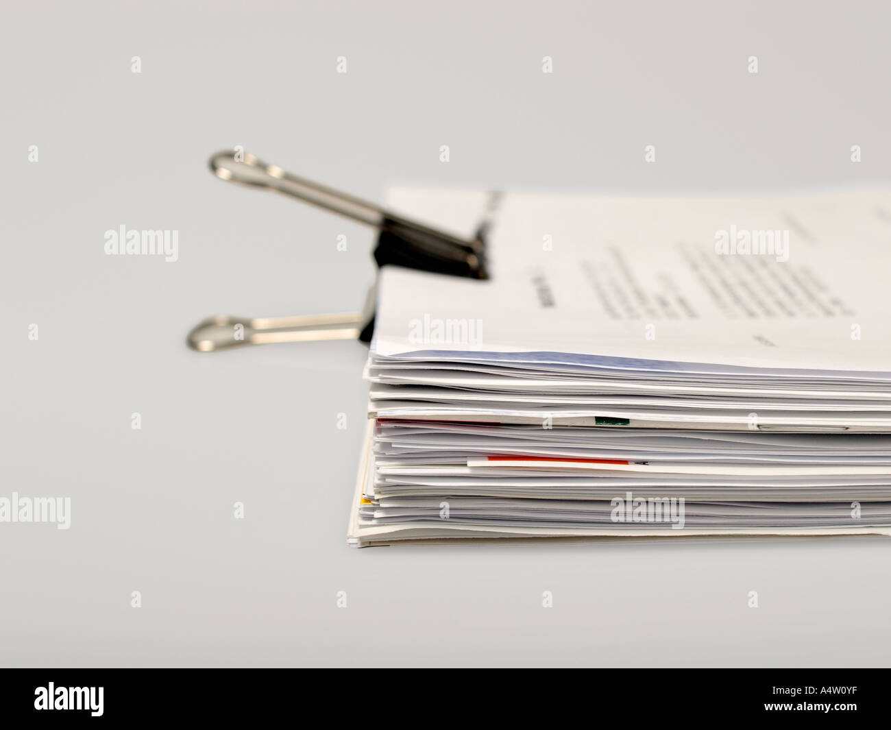 Stack of paperwork clipped together Stock Photo - Alamy