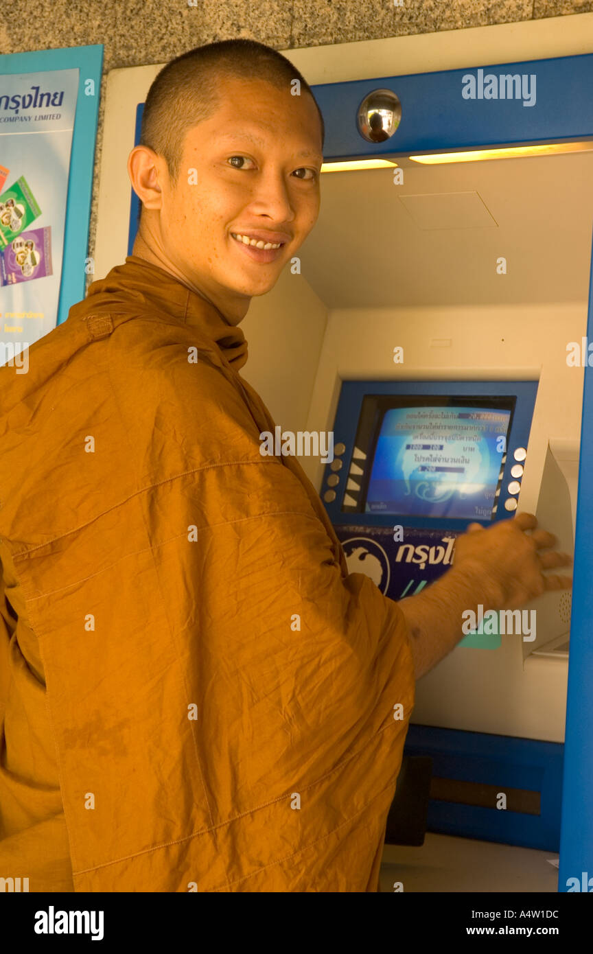 Monk at a ATM Stock Photo - Alamy