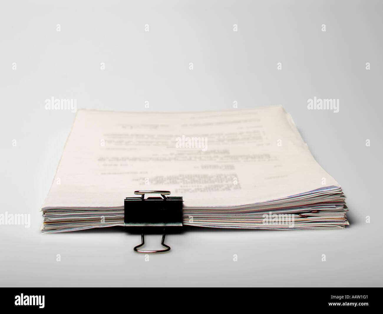 Stack of paperwork clipped together Stock Photo - Alamy