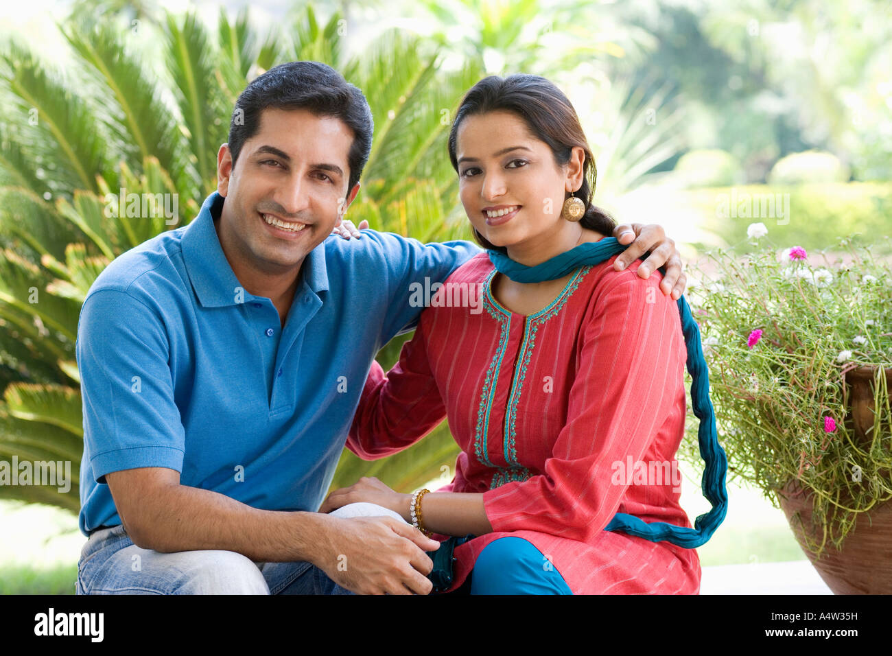 Couple smiling together outdoors Stock Photo - Alamy