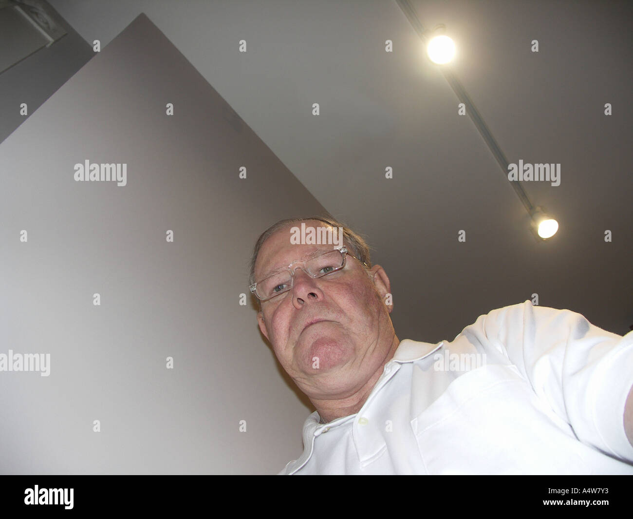 Straight faced man hi-res stock photography and images - Alamy