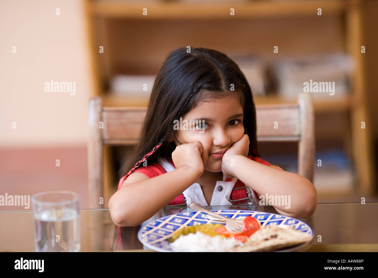 Young girl refusing to eat Stock Photo - Alamy