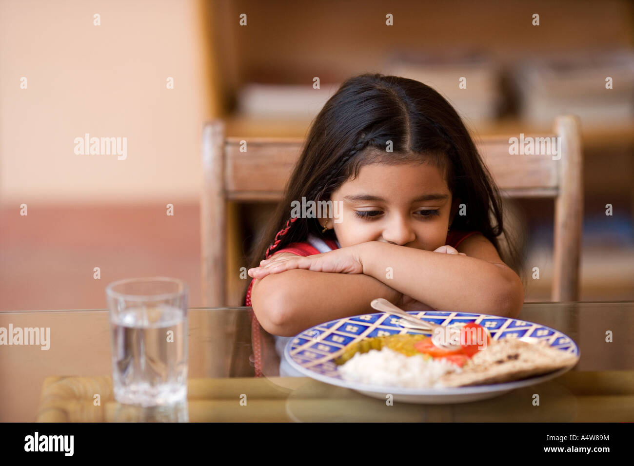 Young girl refusing to eat Stock Photo - Alamy