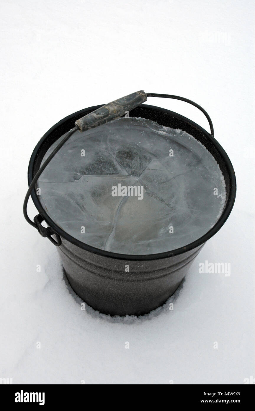 bucket with frozen water Stock Photo - Alamy