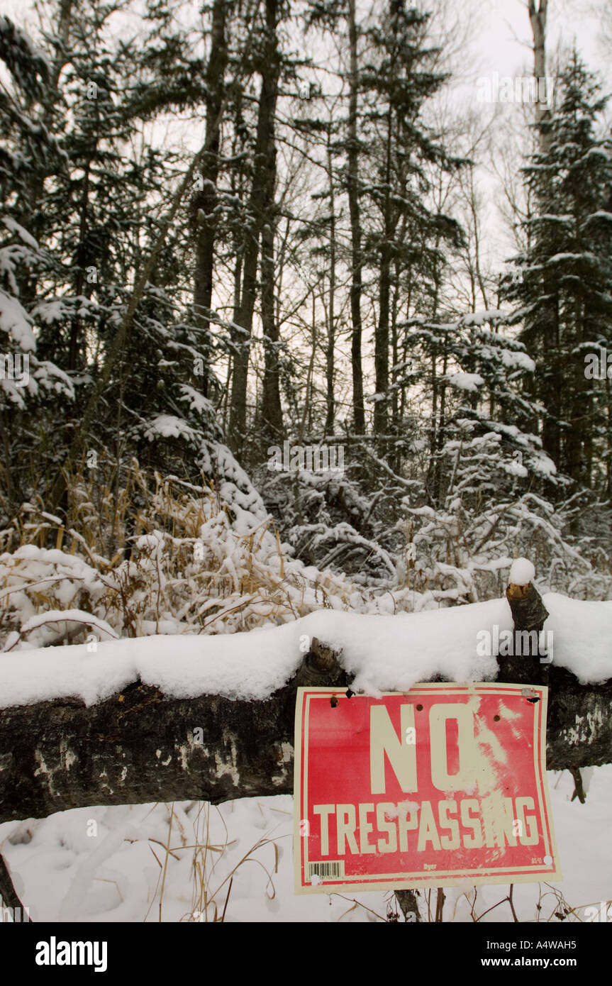 No trespassing sign on fallen tree northern Minnesota Stock Photo - Alamy