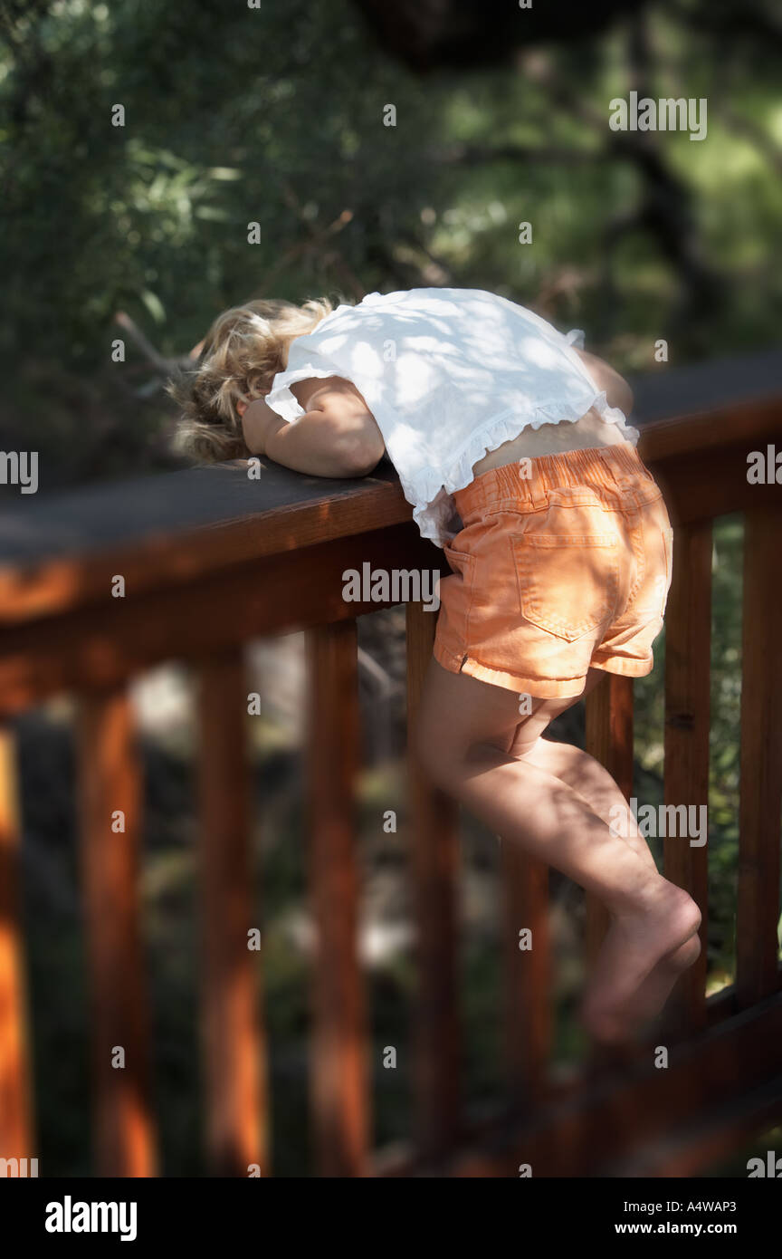 Child looking over bridge hi-res stock photography and images - Alamy