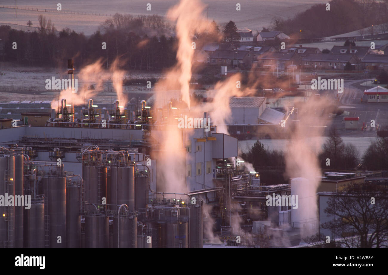 Pollution smoke rising from factory chimneys from an industrail ...