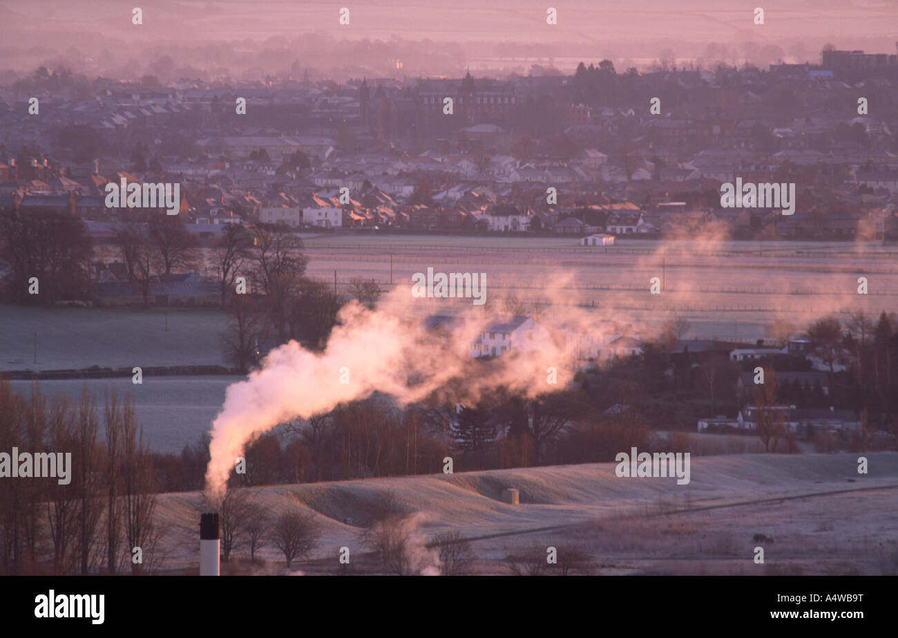 Pollution smoke rising from factory chimneys from an industrail ...
