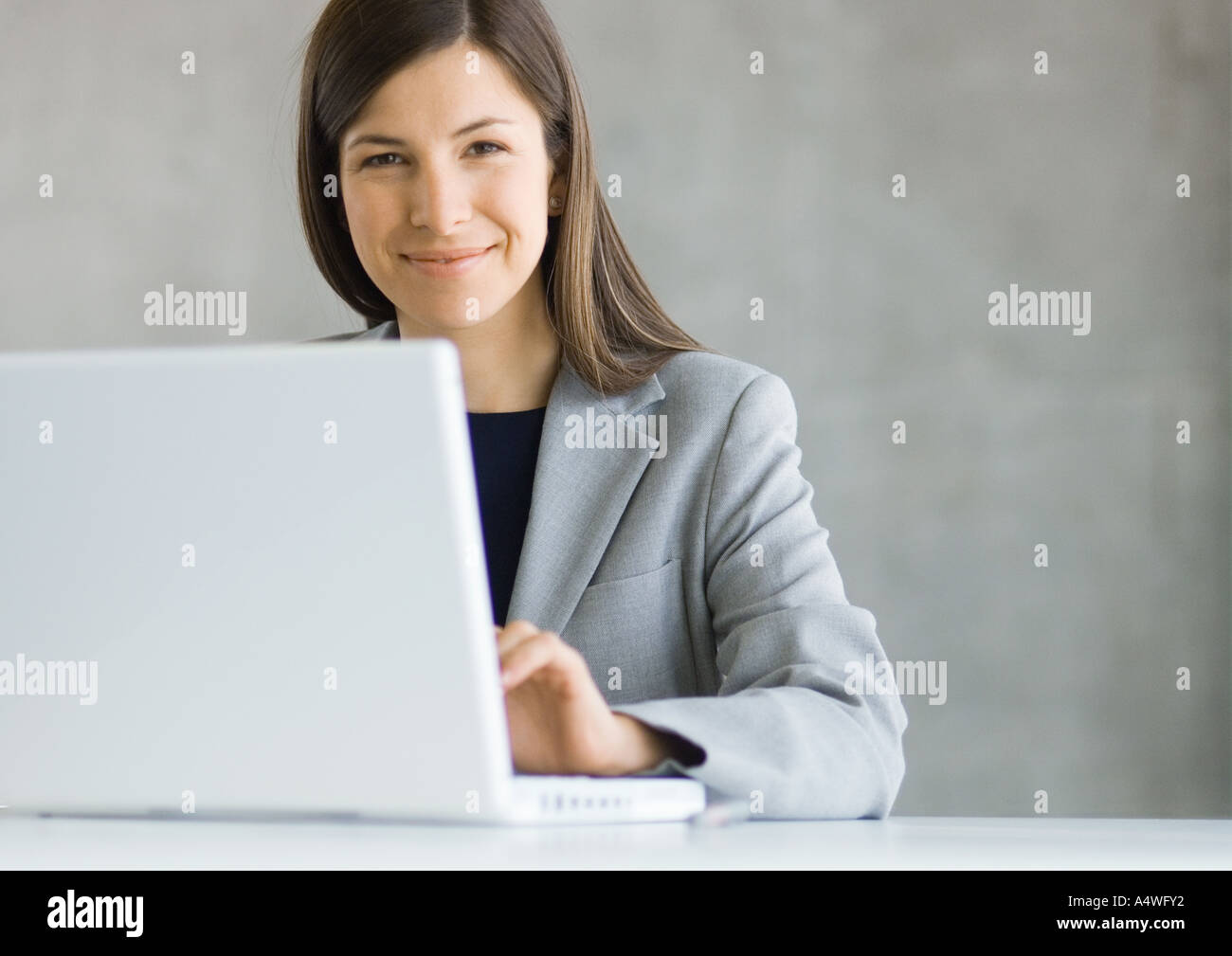Business portraits grey background hi-res stock photography and images ...
