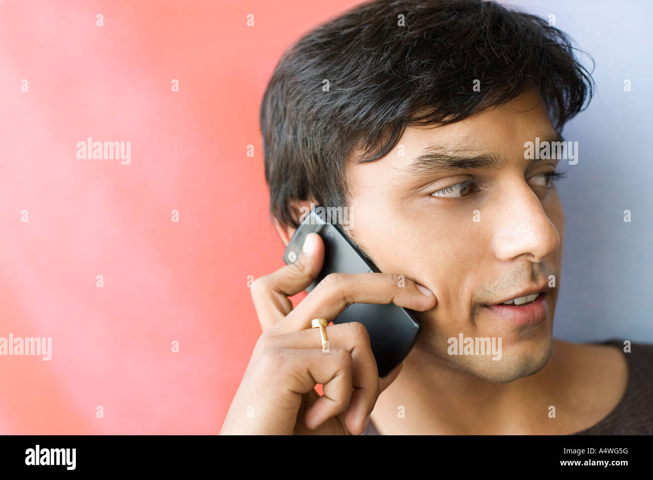 Man talking on cell phone Stock Photo - Alamy