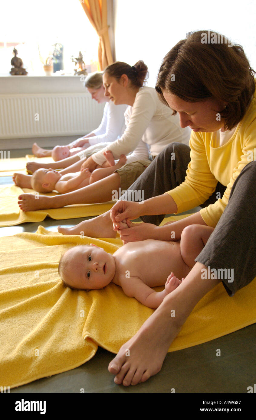 Baby massage class Stock Photo - Alamy