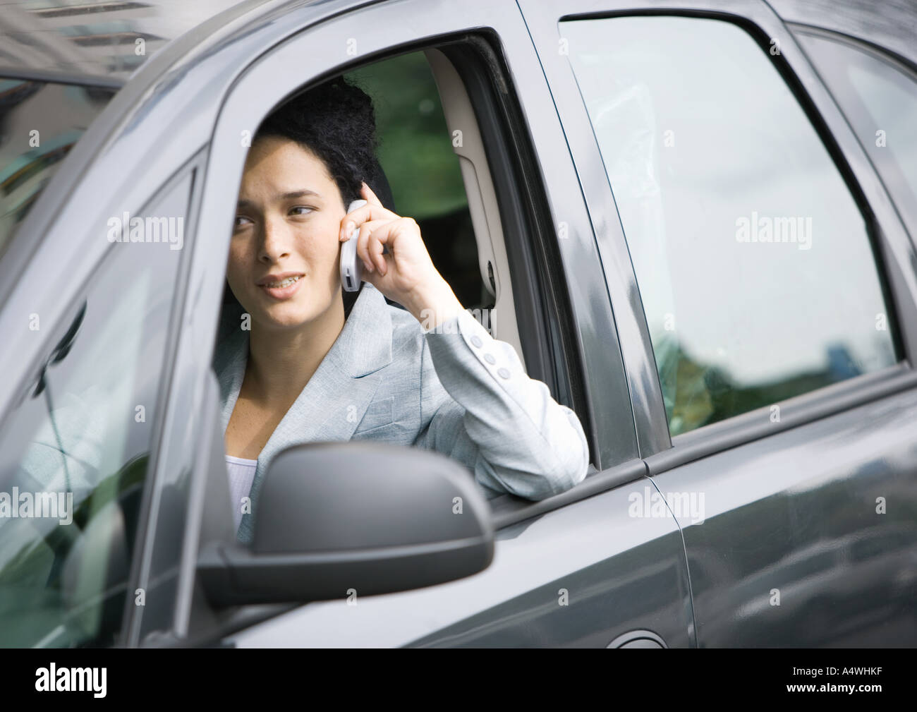 Drivers using mobile phones hi-res stock photography and images - Alamy