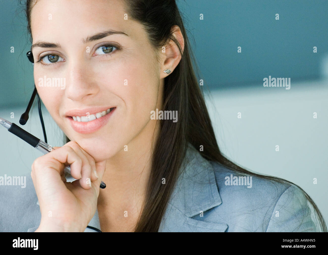 Woman wearing headset Stock Photo - Alamy