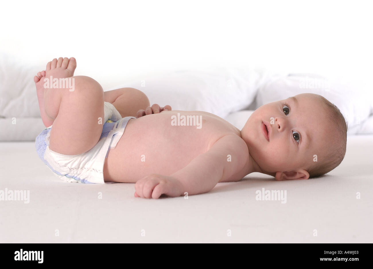 Little baby lying on his back Stock Photo - Alamy