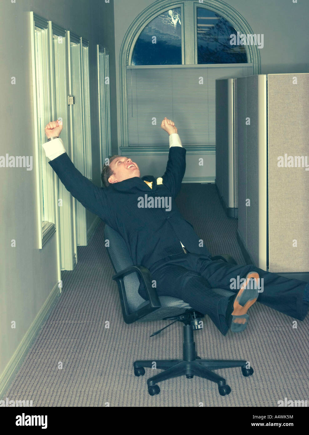 Person spinning an office chair hi-res stock photography and images - Alamy