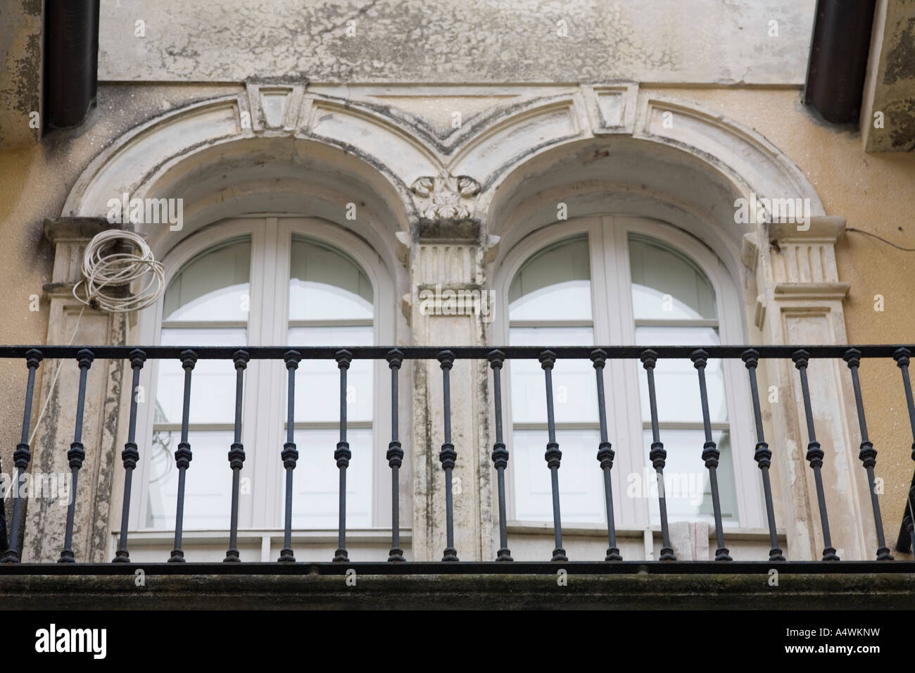 Twin window and small balcony Stock Photo - Alamy