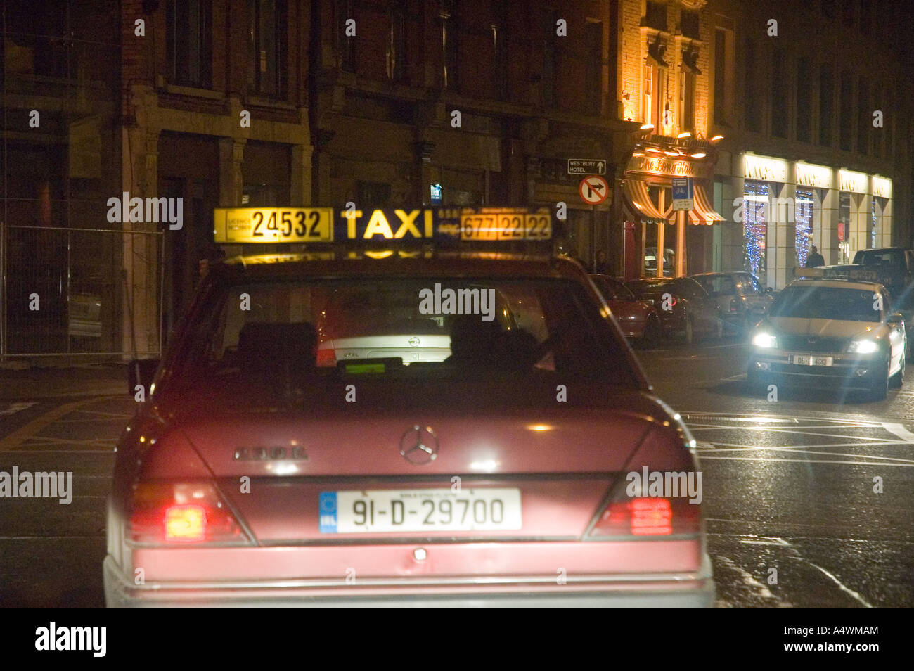 Night time taxi shot in Dublin Ireland Stock Photo - Alamy