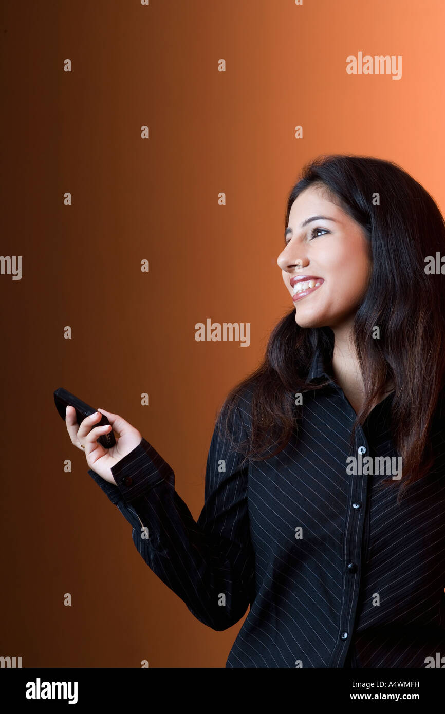 Woman using cell phone Stock Photo - Alamy