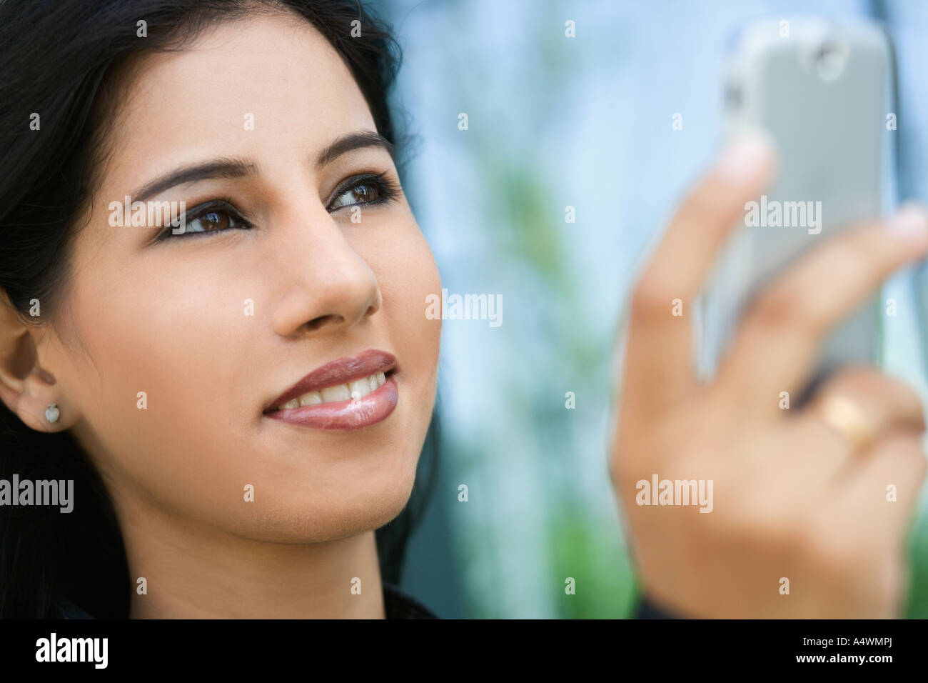 Woman using cell phone Stock Photo - Alamy