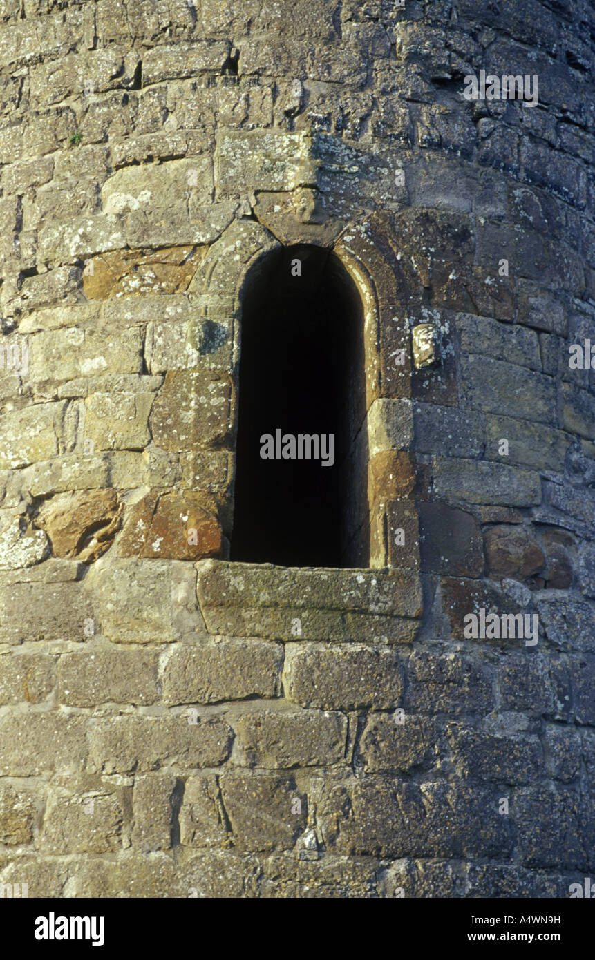 A window on an early Christian period stone round tower in Clonmacnoise ...